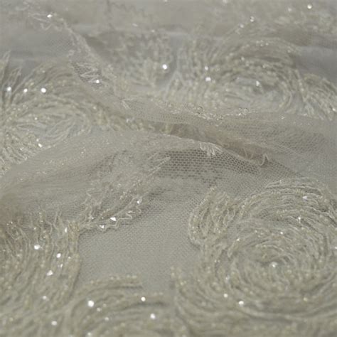 Tissu tulle brodé perlé ivoire Tissus en Ligne