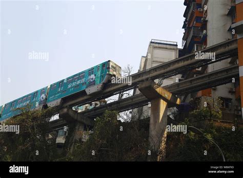 A Subway Train Of Chongqing Light Rail Line 2 Travels On The Monorail