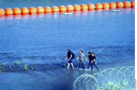 Muere migrante atorado en boyas colocadas en el Río Bravo