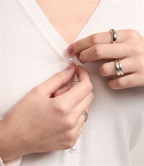 Cardigan em Tricô Manga Bufante e Botão Perola Off White