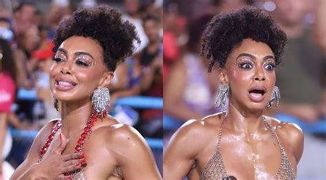 Vestido de Dandara Mariana arrebenta na avenida e seios ficam à mostra