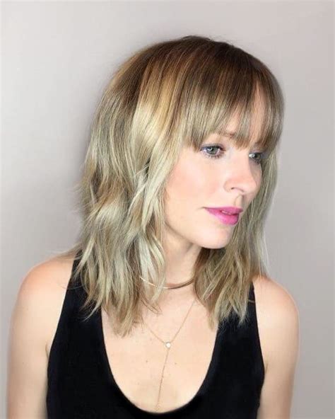 Popular Shag Haircuts Women Are Getting In Bangs With Medium