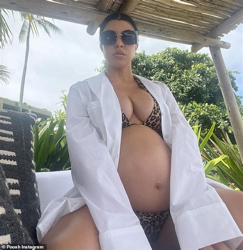 Kourtney Kardashian Displays Her Pregnant Tummy In A Leopard Print