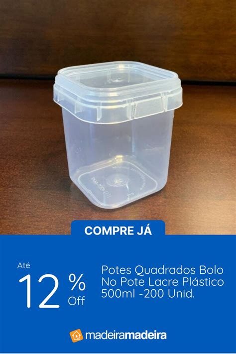 A Plastic Container Sitting On Top Of A Wooden Table