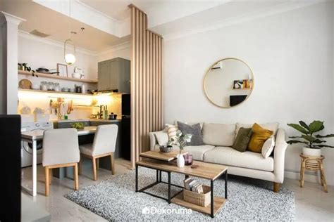 A Living Room Filled With Furniture Next To A Dining Table And White