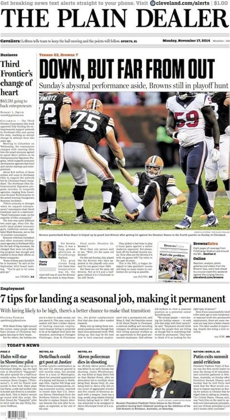 The New York Times Newspaper Front Page With An Image Of Football