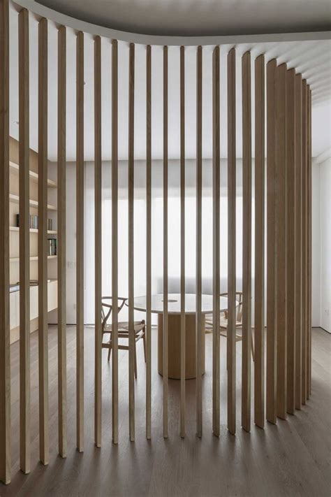 A Room With Wooden Slats On The Wall