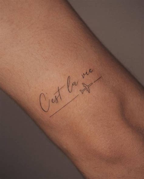 Cest La Vie Lettering Tattoo On The Tricep Tattoos Discreet