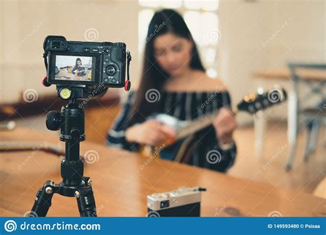 Blogger Live Broadcasting Music Instrument Tutorial On Social Media