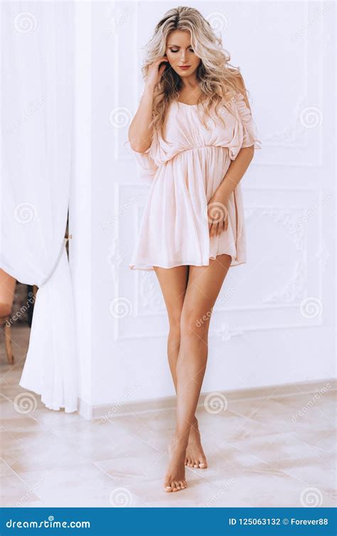 Beautiful Blonde Woman In Pink Stock Photo Image Of Beauty Alone