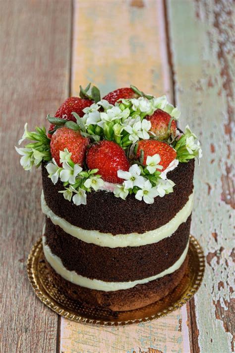 Naked Chocolate Cake Filled With Coconut Brigadeiro Decorated With