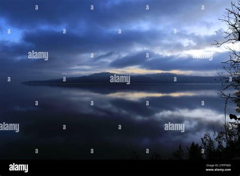 A Misty Dawn Over Loch Lomond From Duck Bay Balloch Village West Dunbartonshire Scotland Uk