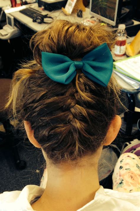 Cute Upside Down French Braid With A Bow And A Messy Bun On Top