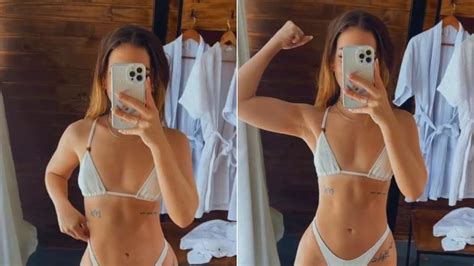 De biquíni branco Mel Maia exibe físico após treino intenso O shape