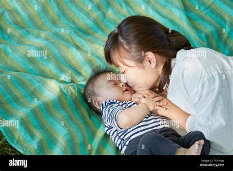 Japanese Mother And Son At The Park Stock Photo Alamy