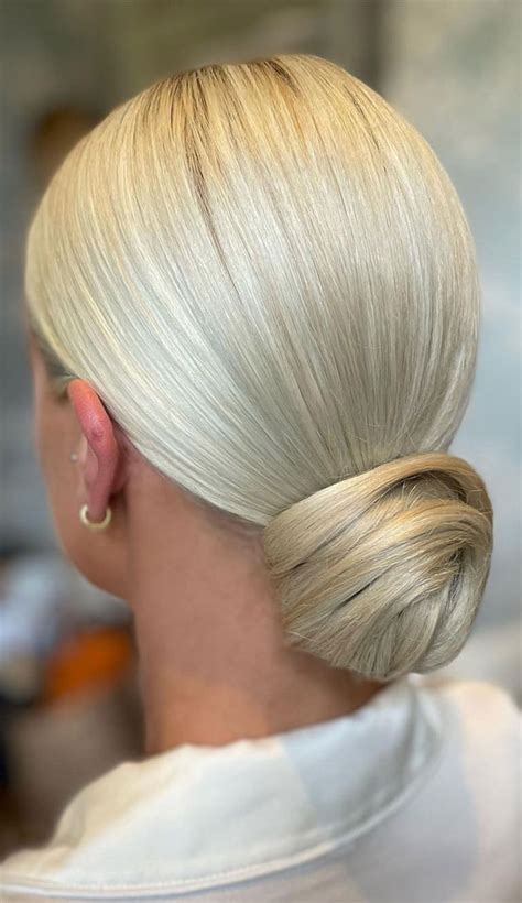 Updo Hairstyles That Re So Stylish Sleek Low Bun Blonde Hair