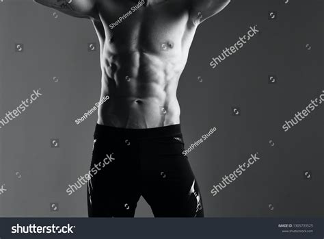 Pumpedup Male Athlete Nude Muscular Body Foto Stok