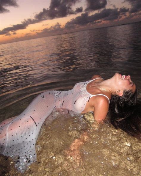 Addison Rae Cheekily Parades Coconuts As She Ditches Bra In Dripping