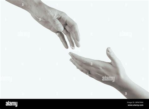 Two Hands Reaching Toward Each Other Helping Concept Vintage Tone