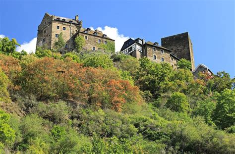 An Old Building On The Side Of A Hill