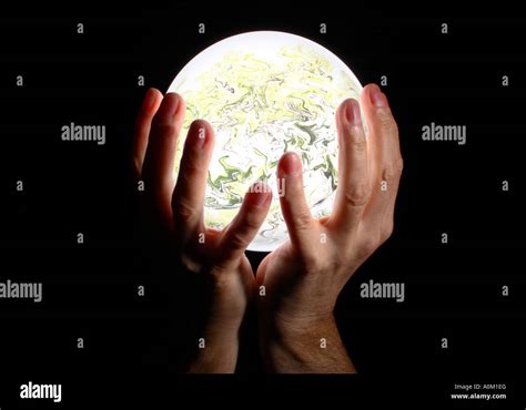 Hands Holding Crystal Ball Hi Res Stock Photography And Images Alamy