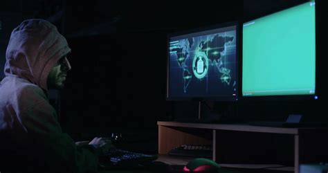 Anonymous Hacker Sitting In Dark Room In Stock Footage SBV 309840186