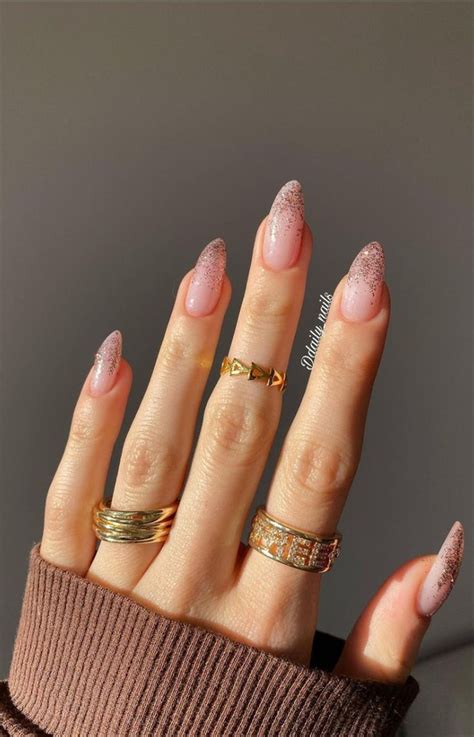 Elegant Nude Almond Nails Design For Spring Nail Colors