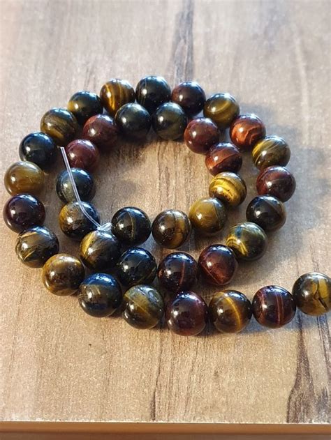 1 Strang natürliche mehrfarbige Tigerauge Steinperlen 8 mm Kaufen auf