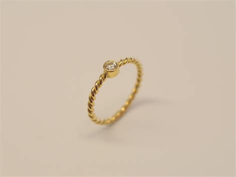 Kordelring 750 Gelbgold mit Brillant im höllwerk Shop bestellen