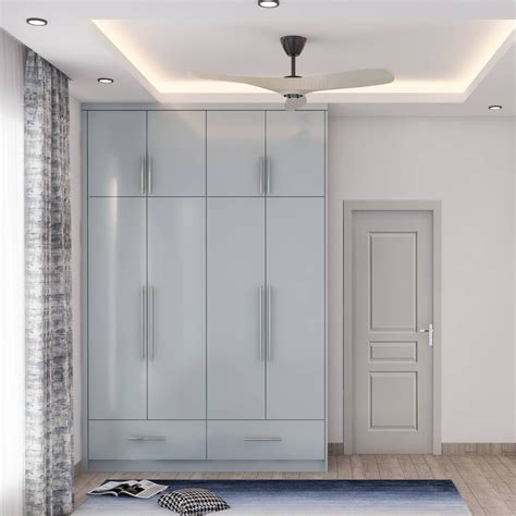 4 Door Wardrobe Design With Glossy Shutters Livspace