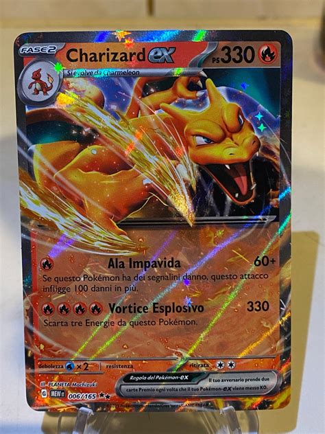Se produkter som liknar Pokémon kort Charizard ex r på Tradera