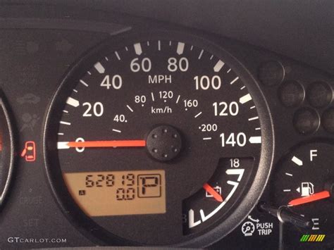 Red Brawn Metallic Nissan Xterra S X Photo