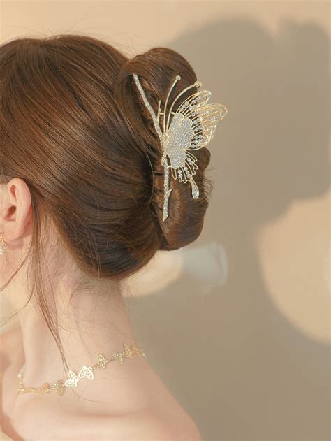 Garra de pelo con diamante de imitación con diseño de mariposa