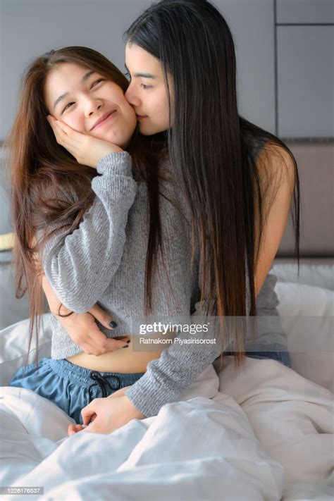 Beautiful Young Asian Women Lgbt Lesbian Happy Couple Hugging And Smiling While Lying Together