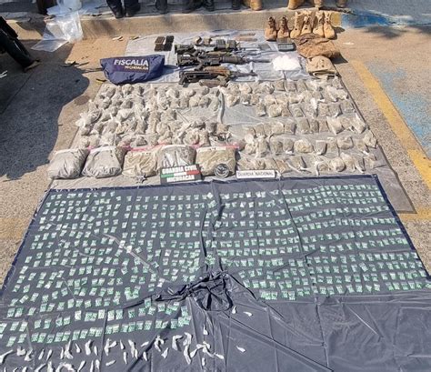 SSP GN y FGE aseguran a dos presuntos miembros de célula delictiva con