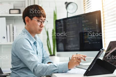 Developing Programmer Development Website Design And Coding Technologies Working At Home Stock