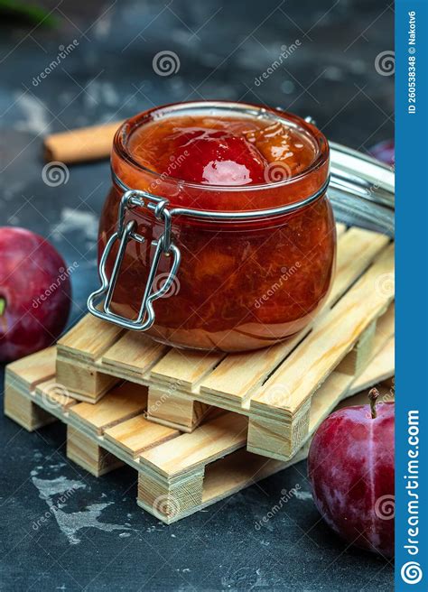 Homemade Plum Jam And Fruits Vertical Image Top View Stock Photo