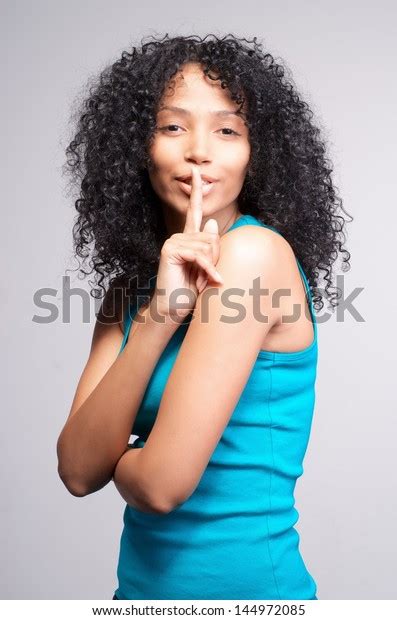 Multiracial Girl Signalling Be Quiet Stock Photo 144972085 Shutterstock