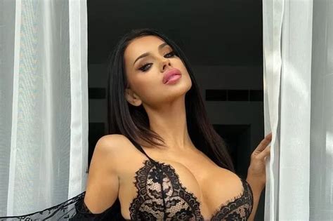 Model Gets Racy In Lace Lingerie As She Drops Robe And Flashes Bum Daily Star