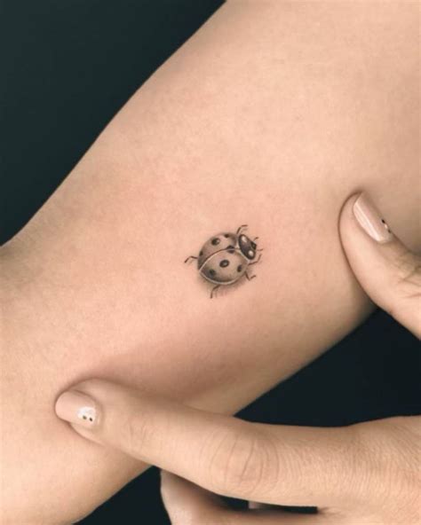 Micro Realistic Ladybug Tattoo Done On The Inner Arm