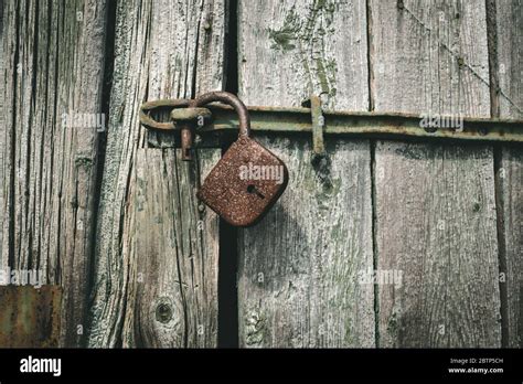 Old Rusty Padlock On Wooden Door Open Vintage Lock Safety Protection