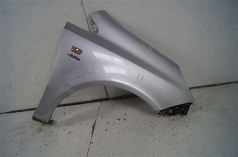 Błotnik przedni prawy Opel Corsa D lift Z176 06 14 14043097383