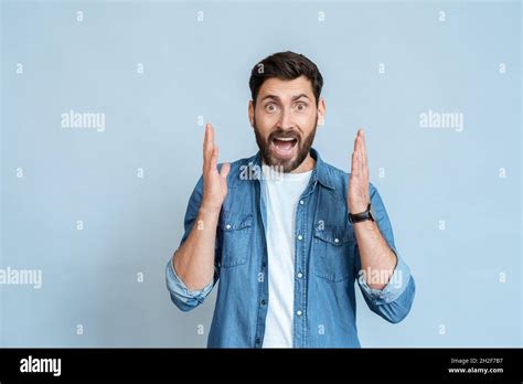 Half Body Portrait Of Surprised Shocked Caucasian Man With Opened Mouth