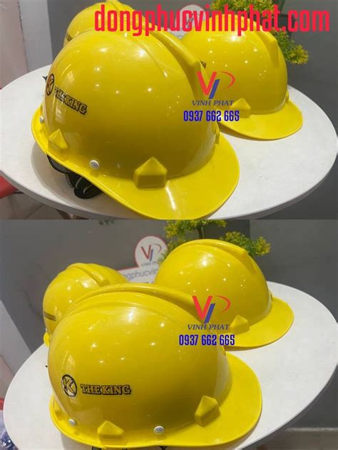 Nón bảo hộ lao động vàng in logo The King Cung cấp trang thiết bị bảo