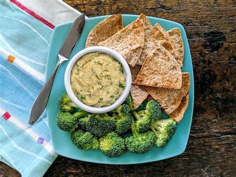 Herbed Hummus With Toasted Pita Chips Broccoli Florets Plant Fueled