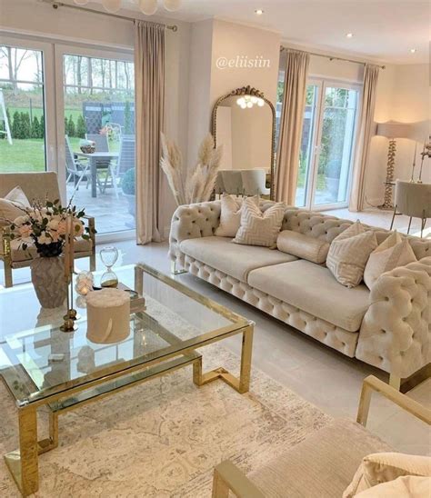 A Living Room Filled With Furniture And Lots Of Windows
