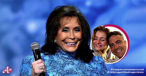 Loretta Lynn S Granddaughter Emmy Hugs Dad Philip Russell In An