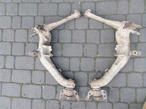 Wahacz tył tylny Avensis T25 prawy prawa dolny 7444844565 oficjalne