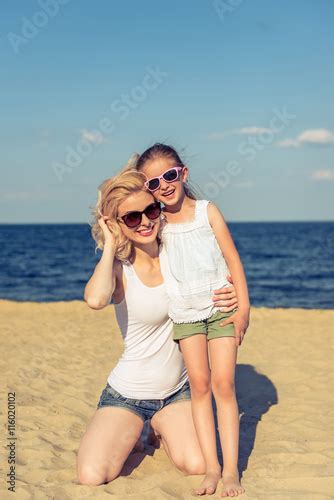 Mom And Daughter On The Beach Stock Photo And Royalty Free Images On