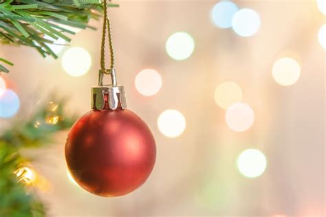 Premium Photo Christmas Decoration Hanging Red Balls On Pine